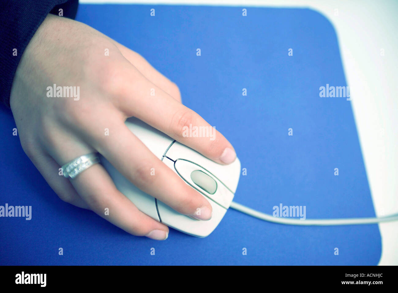 Hand with computer mouse Stock Photo - Alamy