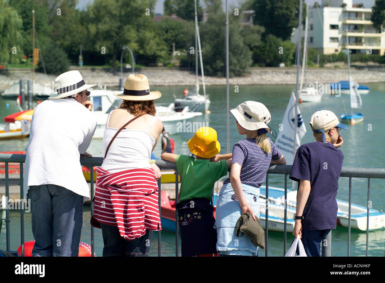 People at harbour Stock Photo - Alamy