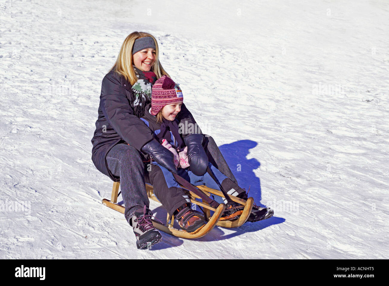 Cheerful blonde woman rides hi-res stock photography and images - Alamy