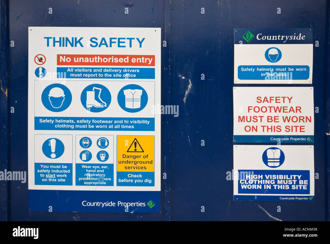 Signs outside a building site Stock Photo - Alamy