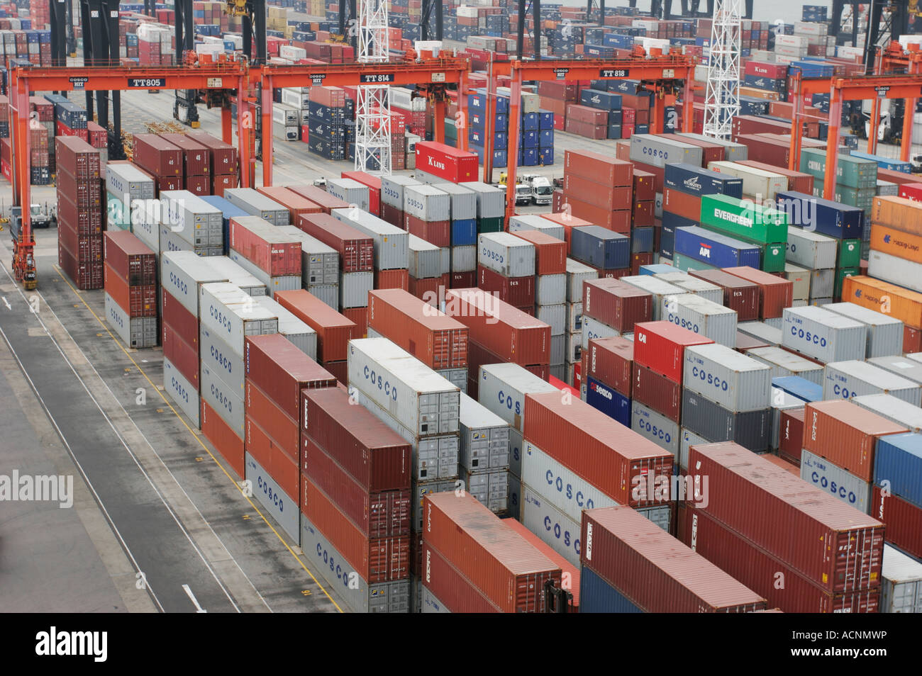 Container stack with straddle cranes in the container terminal at Kwai ...
