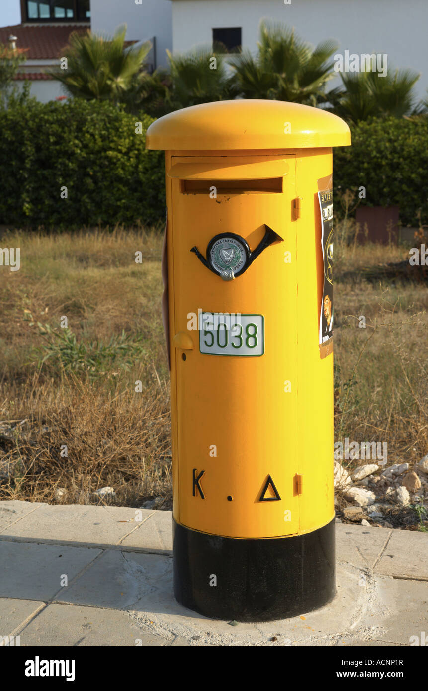 Cyprus A yellow mail box Stock Photo - Alamy