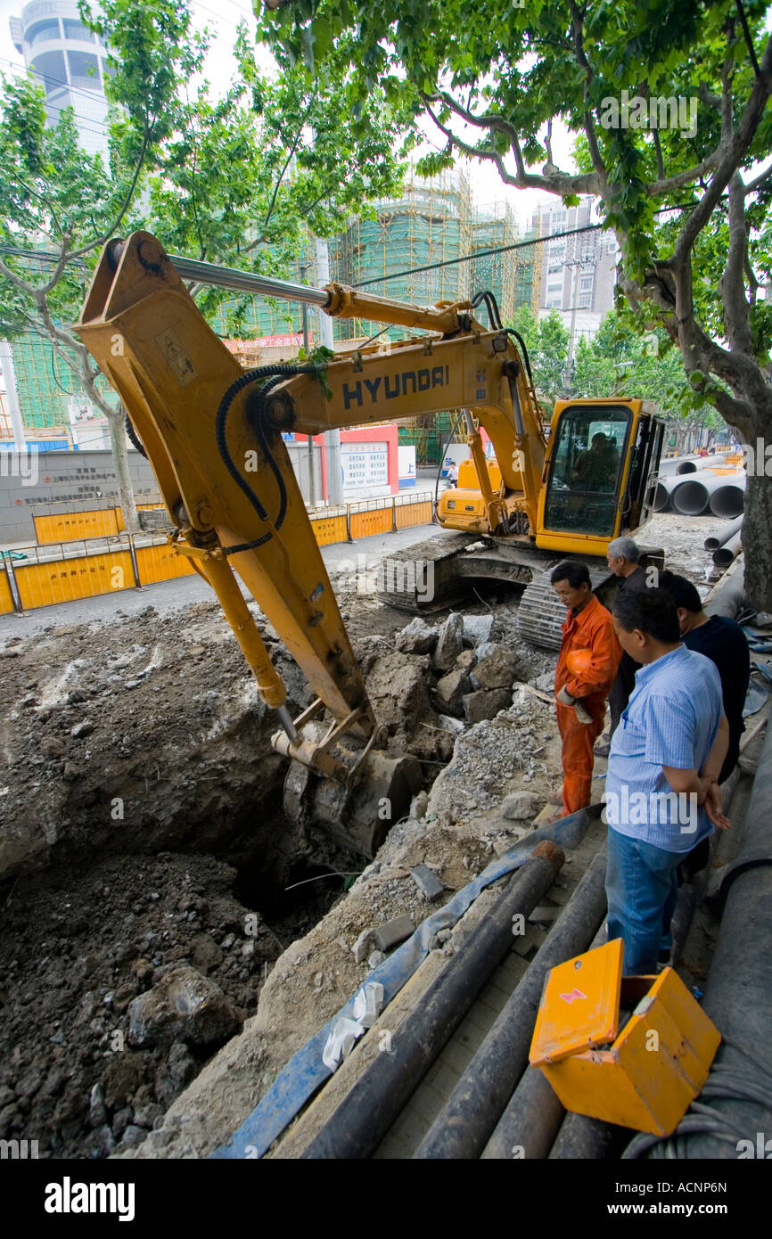 Chinese Workmen using Hyundai Heavy Equipment for Roadwork in Shanghai ...