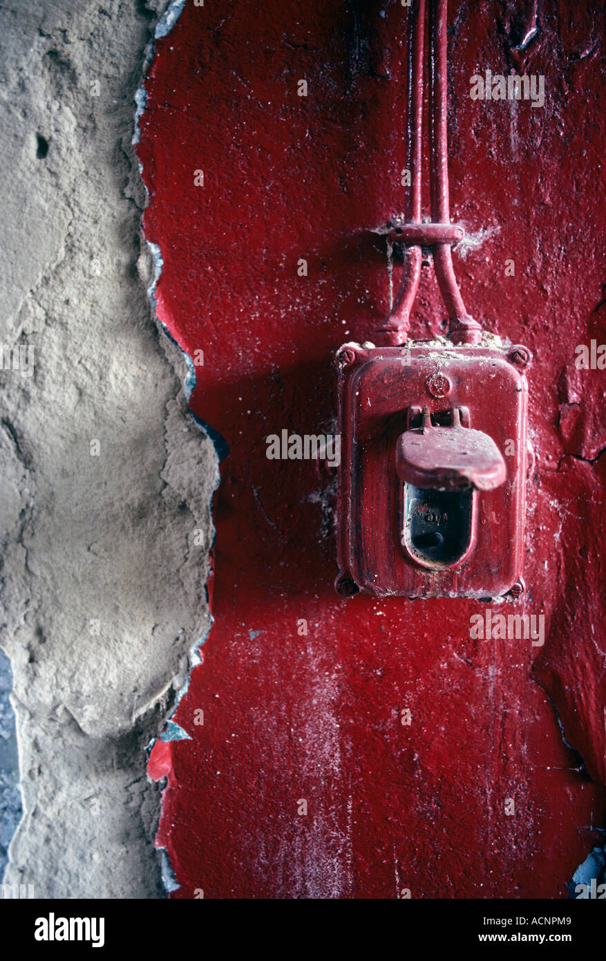 Old Power outlet on red wall Stock Photo - Alamy