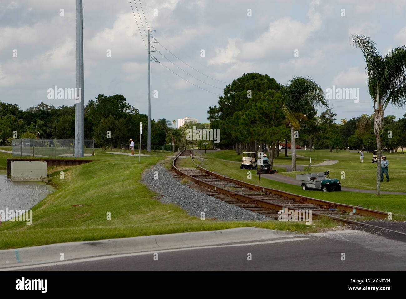 Railroad Tracks running through the middle of a Golf Course Stock Photo ...