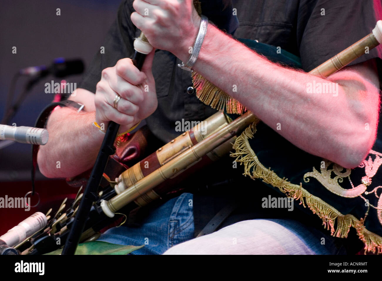 Irish traditional musician playing uilleann pipes live in concert Stock ...