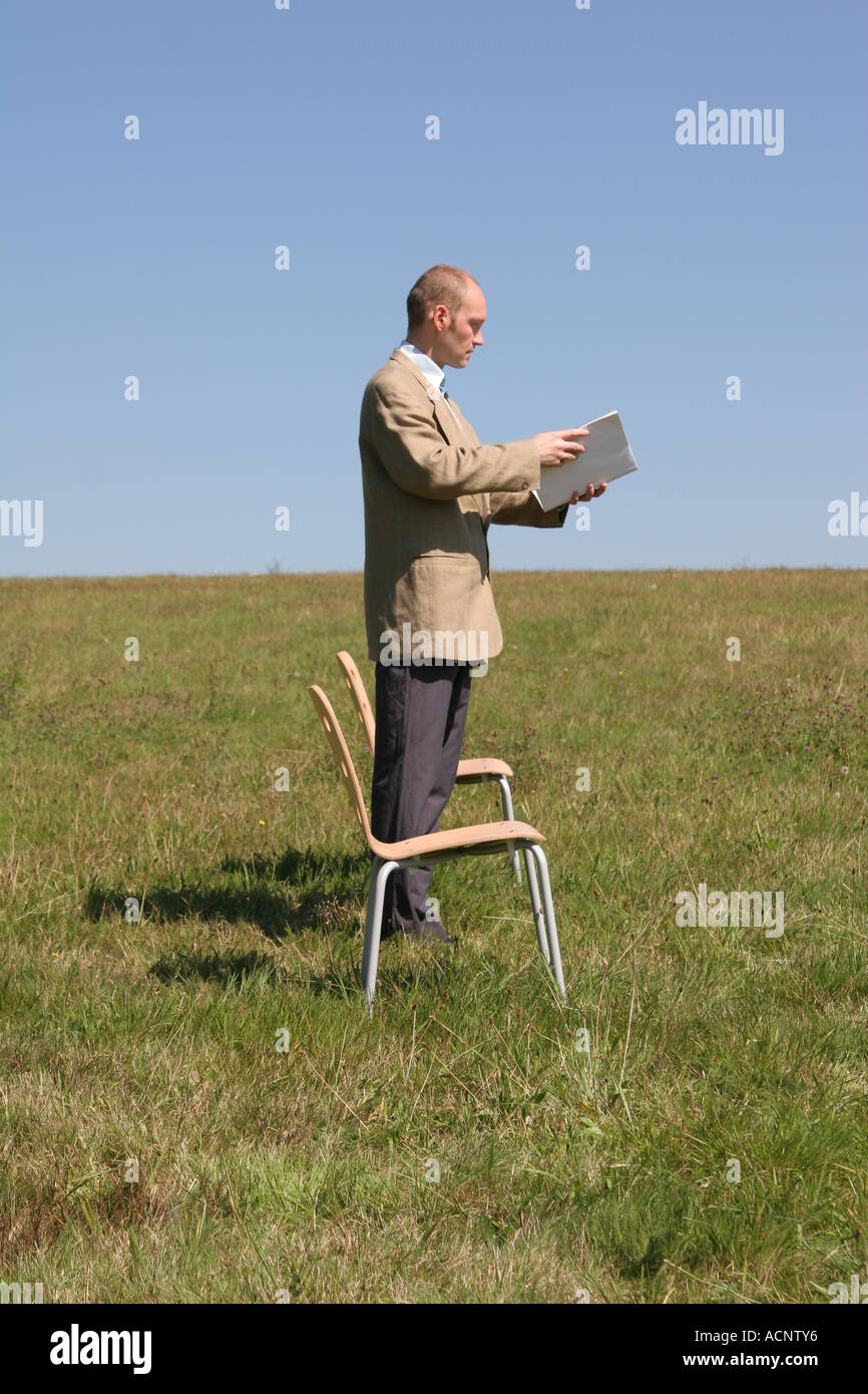 Caught between two stools hi-res stock photography and images - Alamy