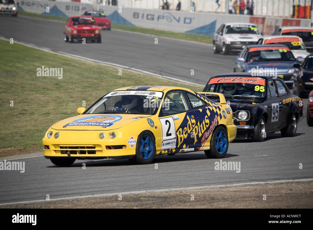 Type R Honda Integra leading the field through a corner during a ...