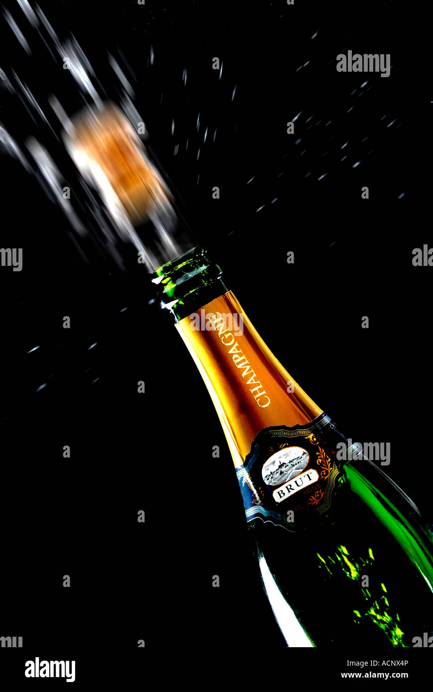 Champagne cork popping in celebration Stock Photo - Alamy
