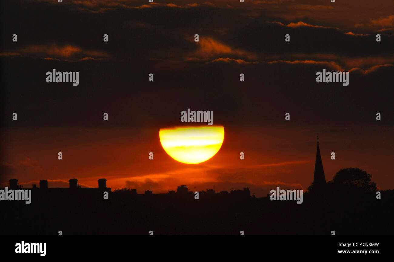 The Sun Setting Behind A Staffordshire Landscape In England Stock Photo ...