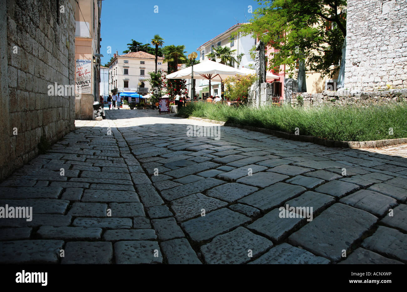 Empty cobbled stone street in Porec Istria Stock Photo - Alamy