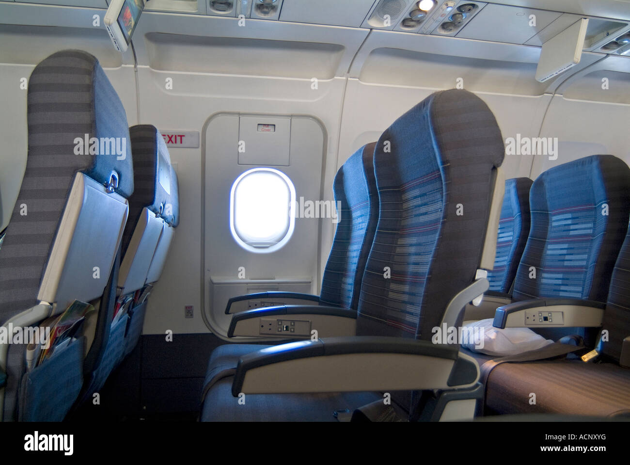 Empty Airplane Seats And Window On Commercial Airline Flight Stock ...