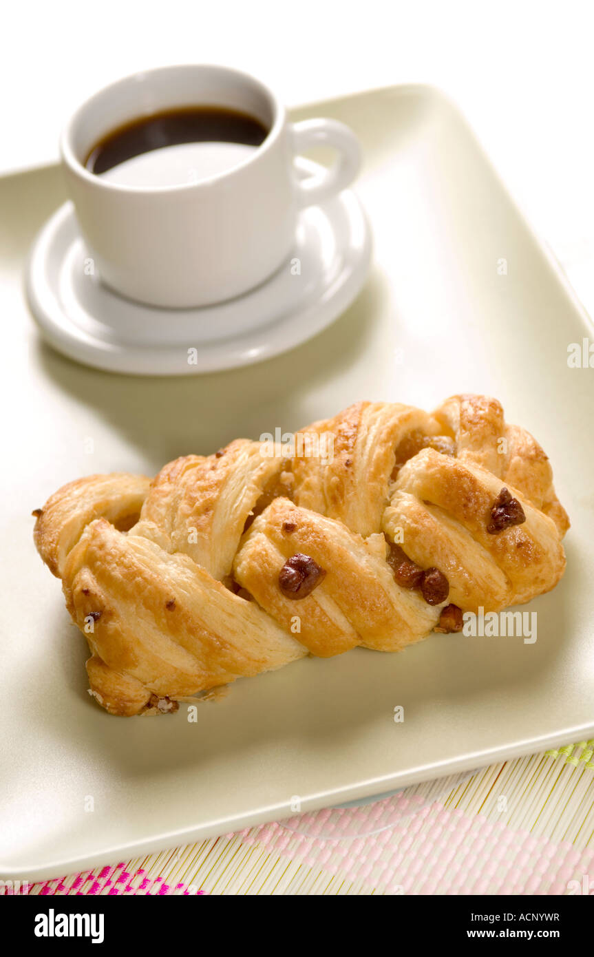 a breakfast of coffee espresso and a danish pastry Stock Photo - Alamy