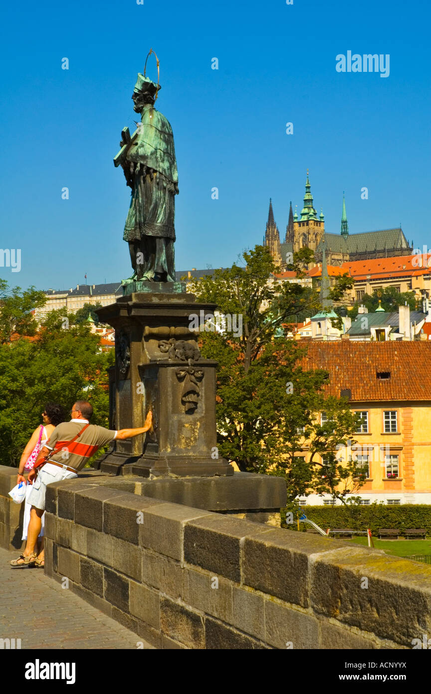 Statue of St John of Nepomuk on Charles Bridge central Prague Czech ...