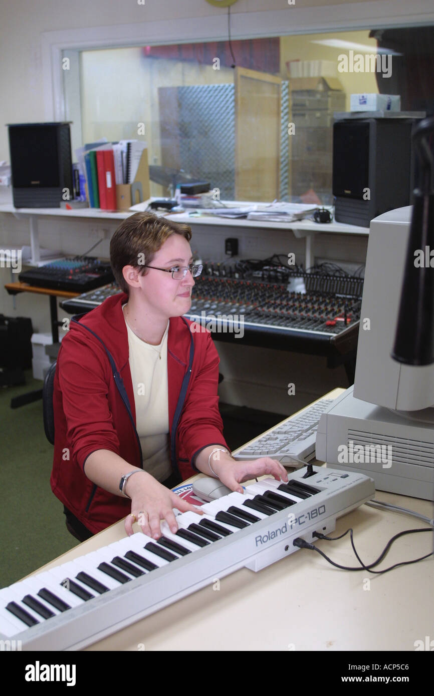 Female student in music studio at Sixth form College South London GB UK ...