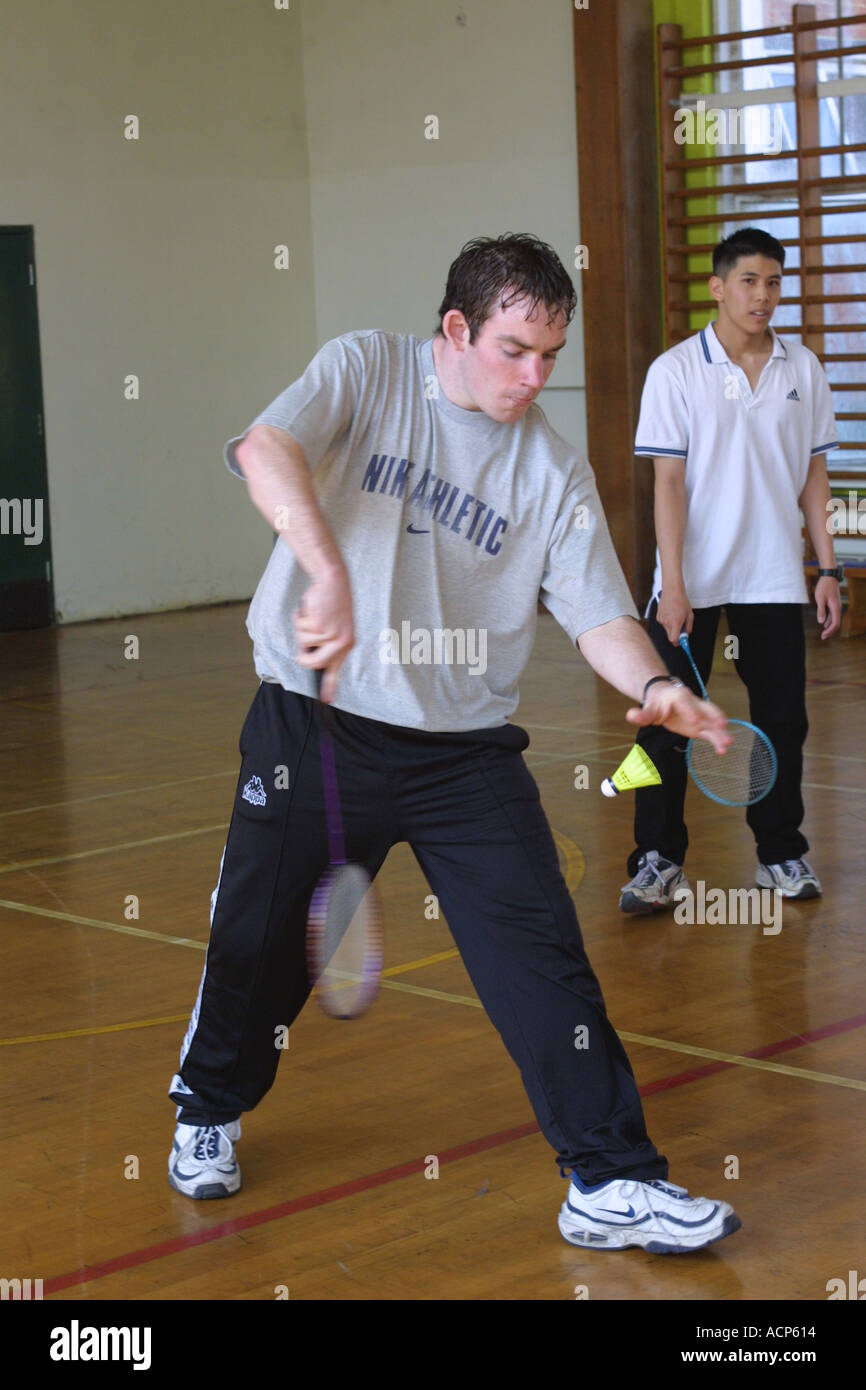 Students playing badminton at Sixth Form College South London Stock ...