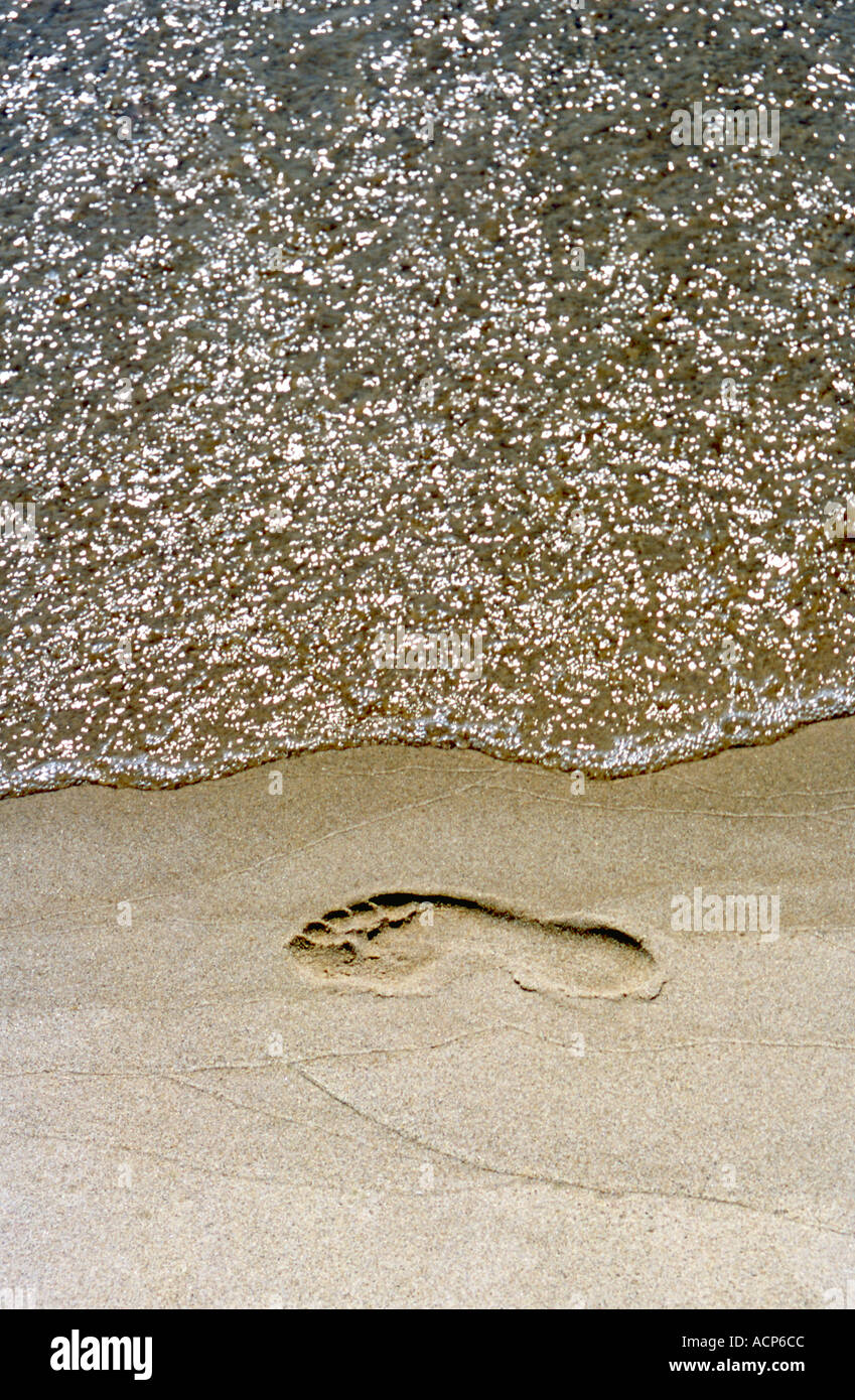Foot print in sand Stock Photo - Alamy