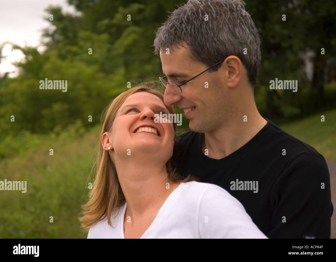 Embrassing hi-res stock photography and images - Alamy