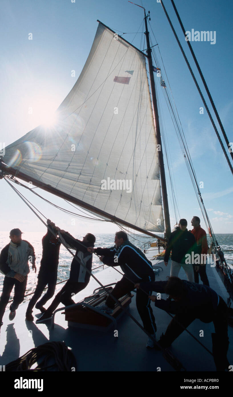 People on sailing ship Stock Photo - Alamy