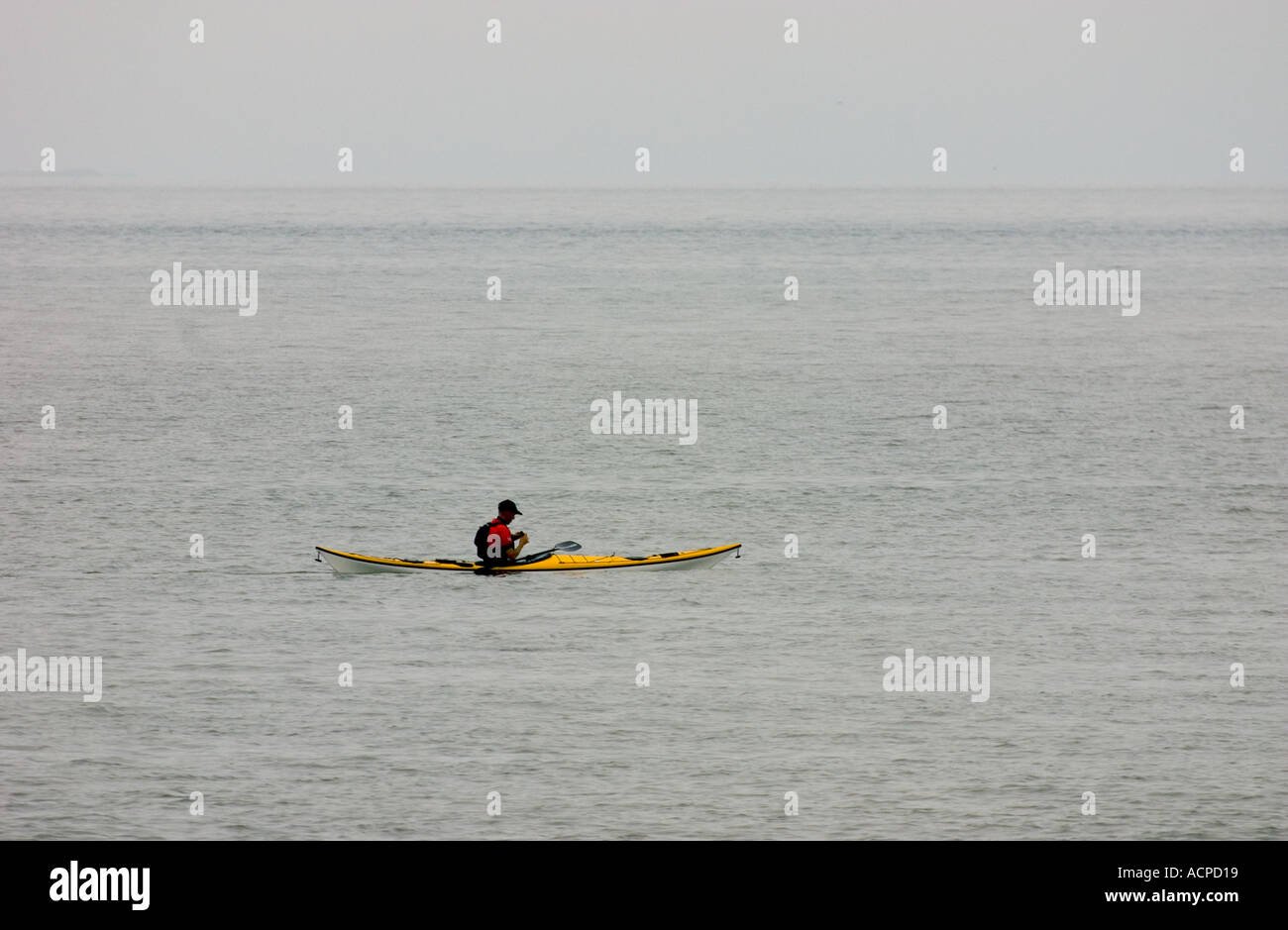 Sea canoeist off Hilbre Island Dee Estuary Stock Photo - Alamy