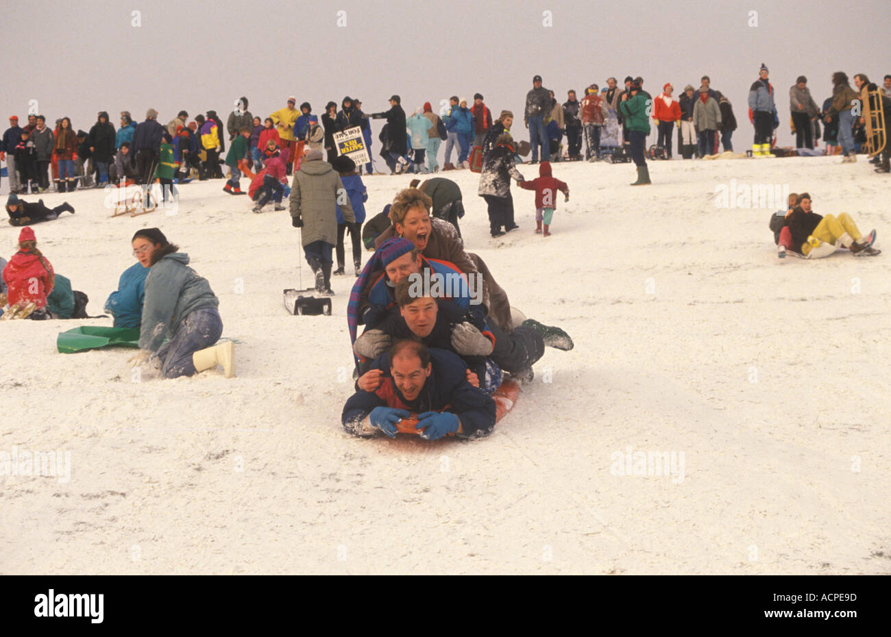 Snow UK 1990s Primrose Hill winter in London families enjoying a white ...