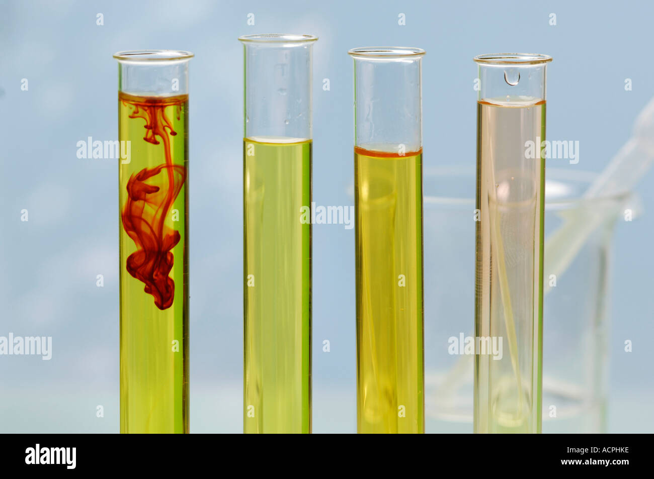 Test tubes with coloured liquid, close-up Stock Photo - Alamy