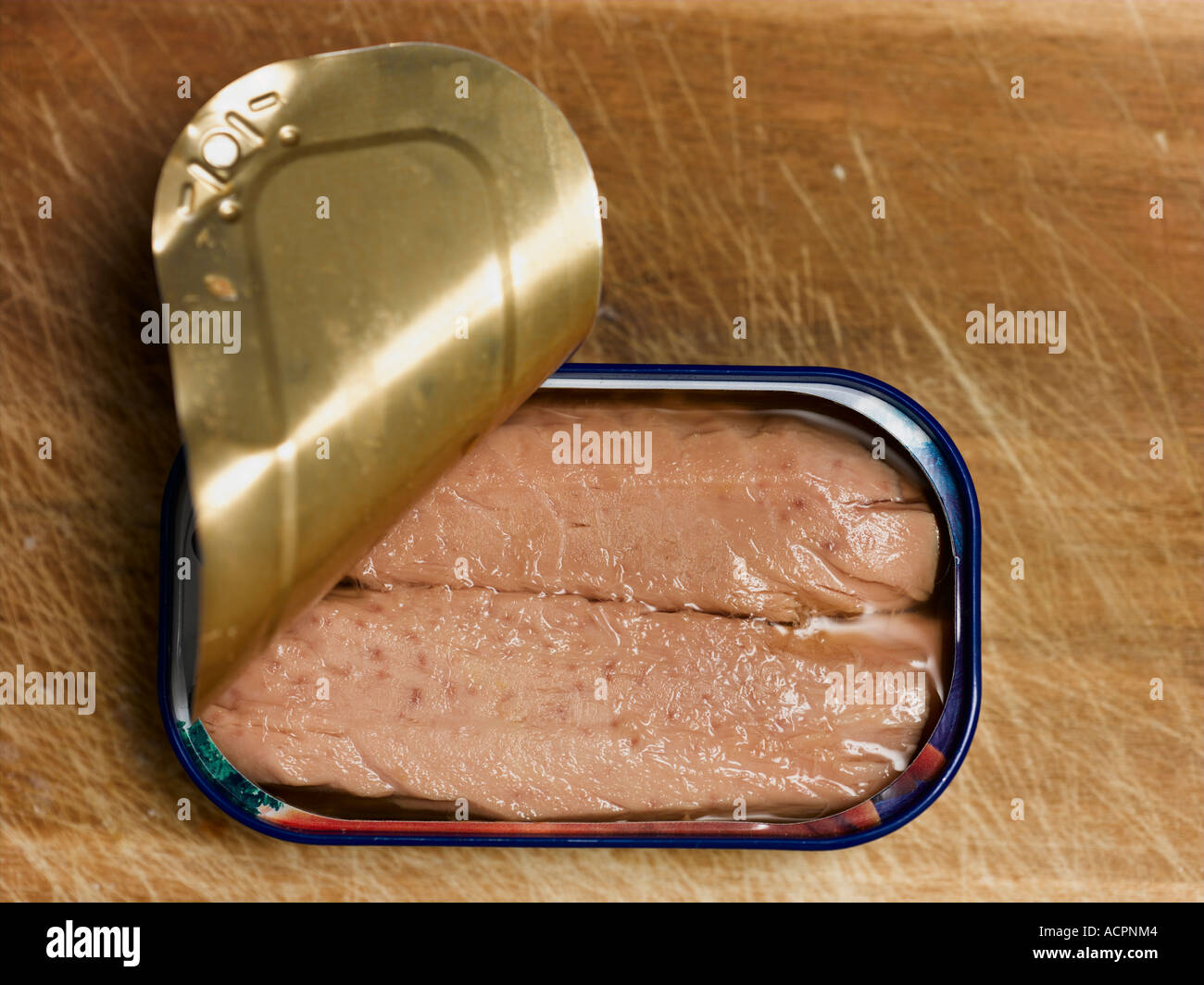 Can of tuna fish, close-up, elevated view Stock Photo - Alamy