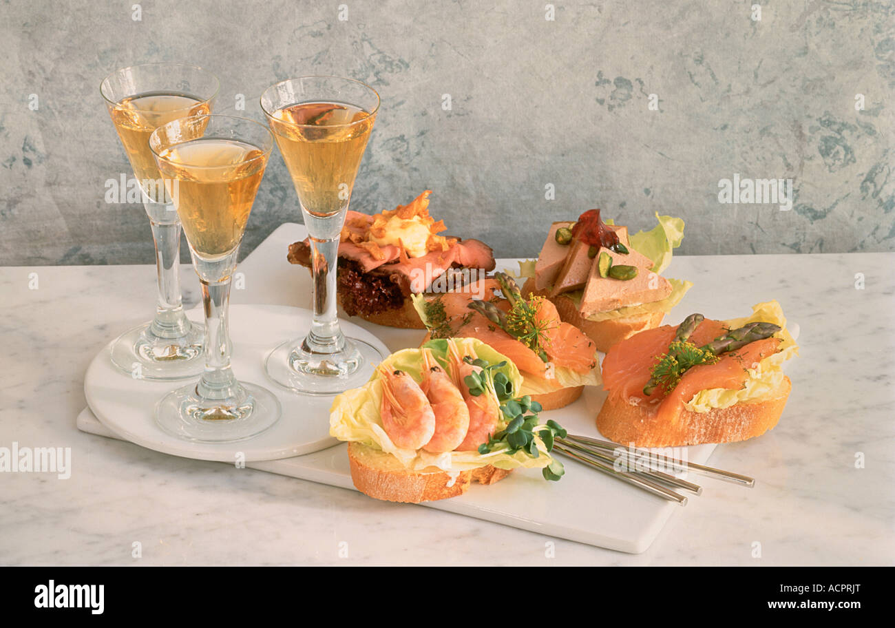 Composition buffet toasts 3 champagne flutes Stock Photo - Alamy