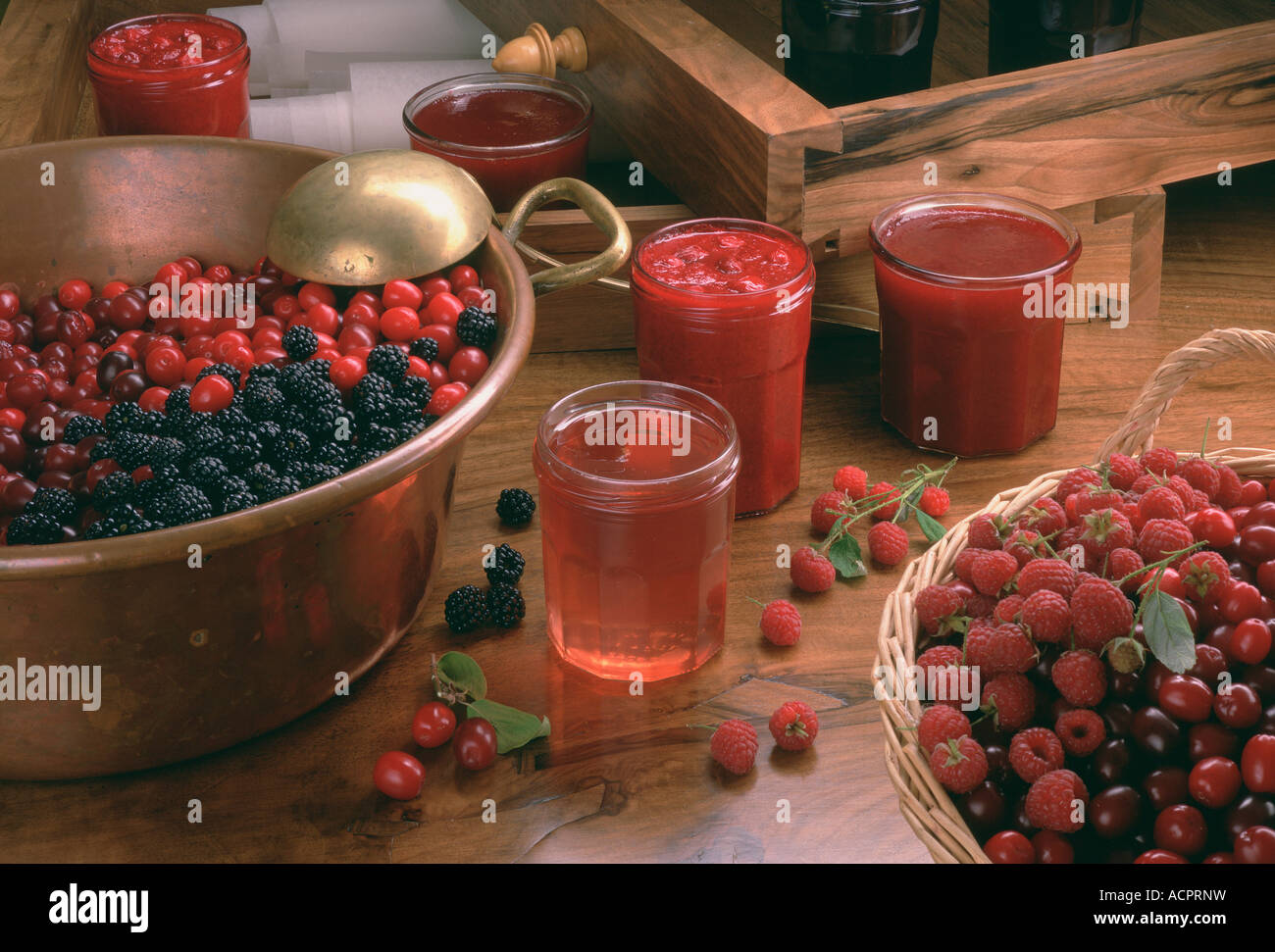 Red fruits jam cherries blackberries raspberries Stock Photo - Alamy