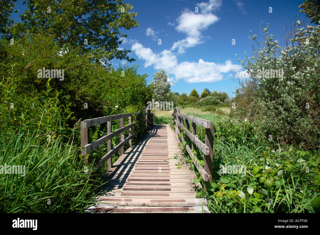 Wooden bridge clouds sky hi-res stock photography and images - Alamy