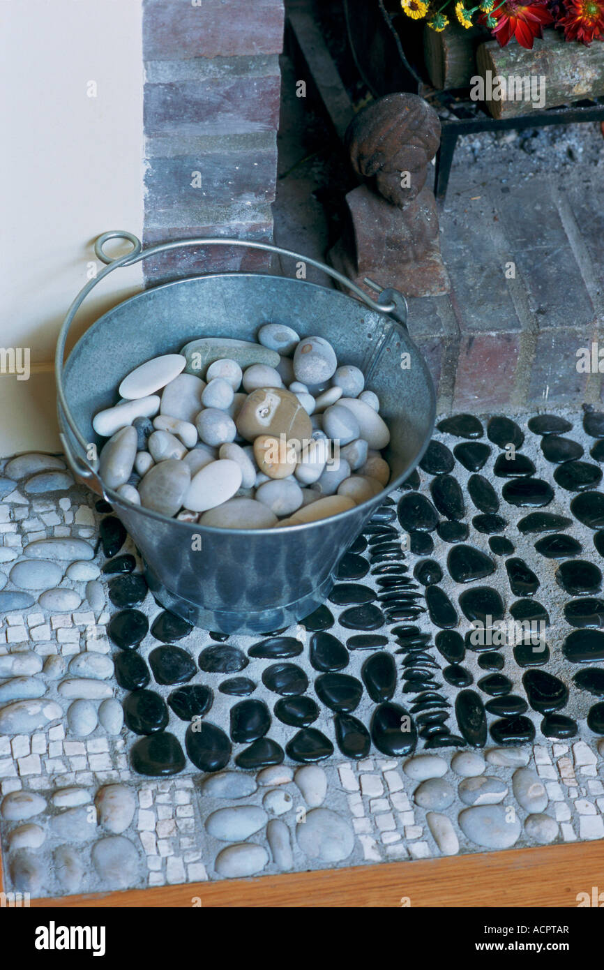 Pebbles in bucket on pebbles floor firedog brick chimney fire wood ...