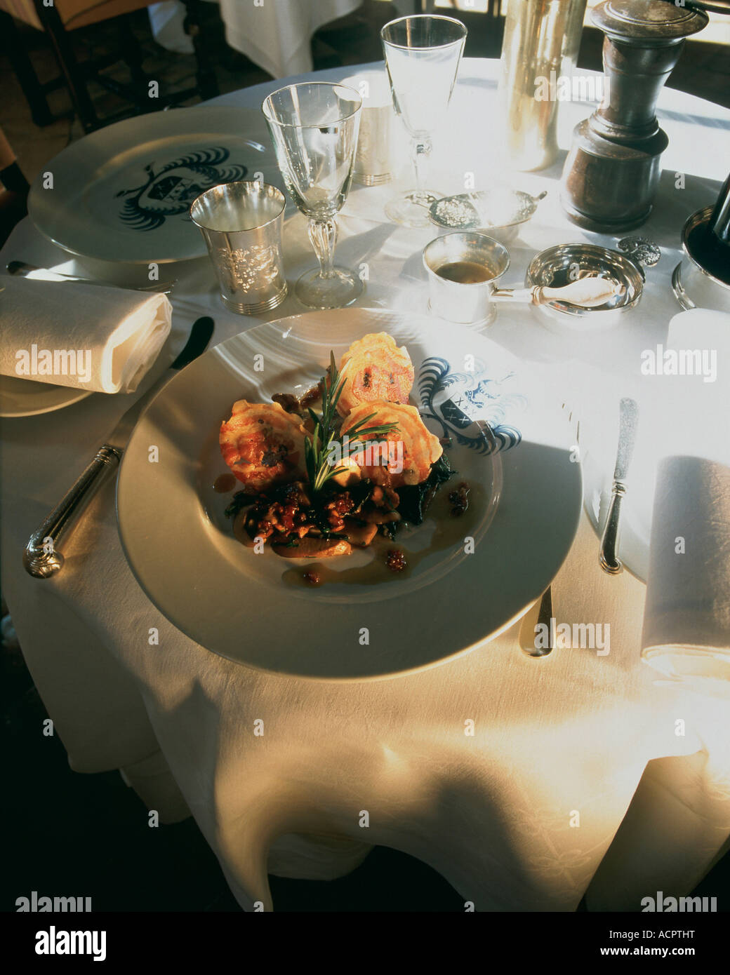 Table laid 1 plate filled Stock Photo - Alamy