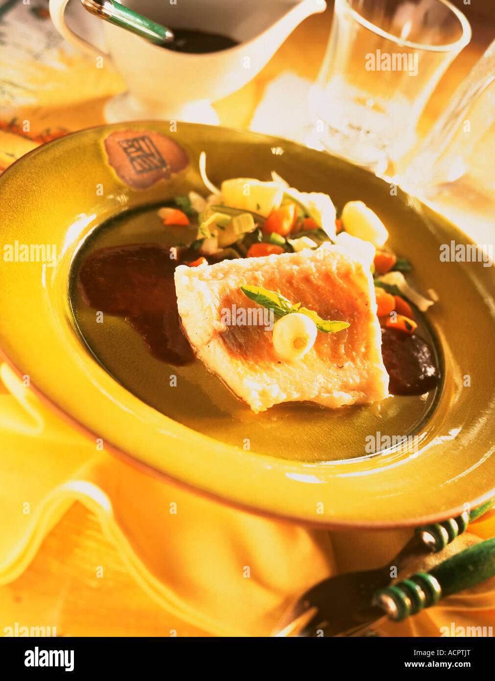 Fillet of fish and vegetables in yellow plate Stock Photo - Alamy