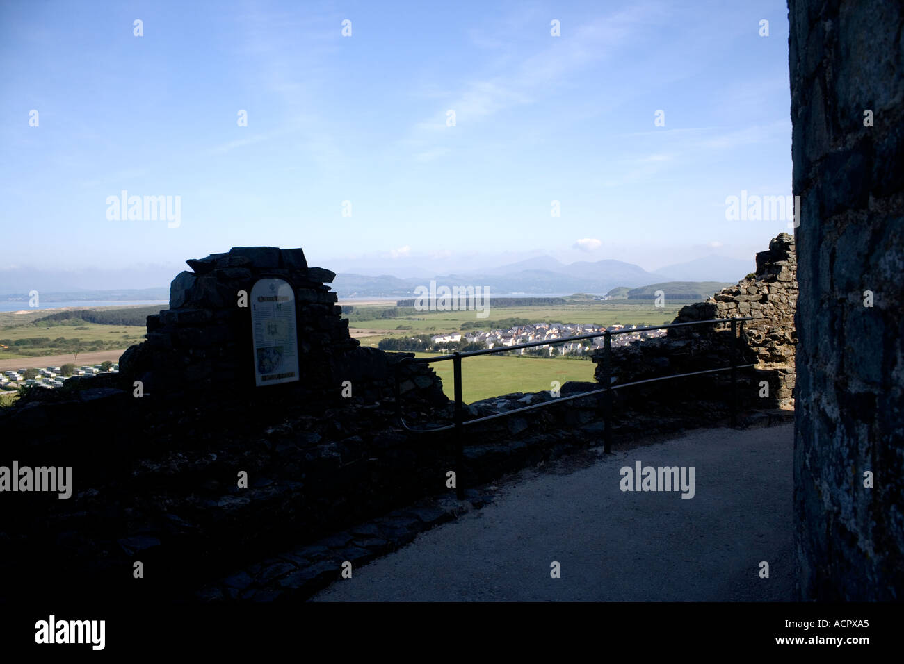 The walls of Harlech Castle and Snowdonian hills beyond North Wales ...
