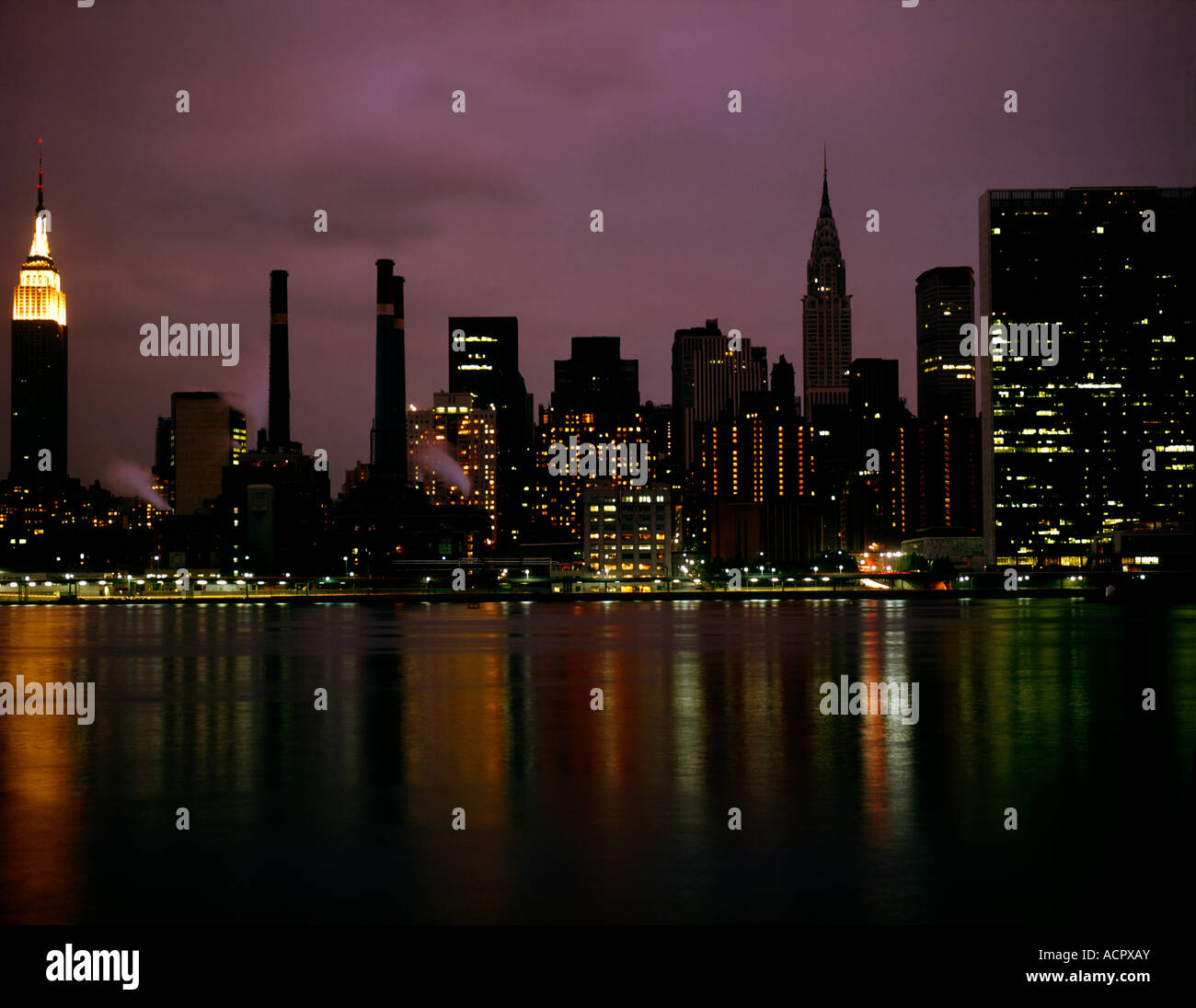 New York City metropolitan skyline seen at night as the skyscrapers ...