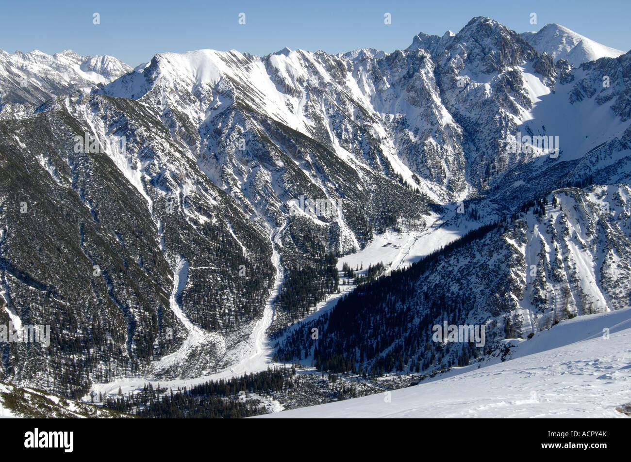 Snowy alpine mountains in the Austrian Tyrol in February Stock Photo ...