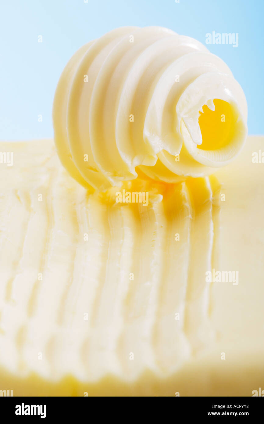 Fresh butter, butter flakes Stock Photo - Alamy
