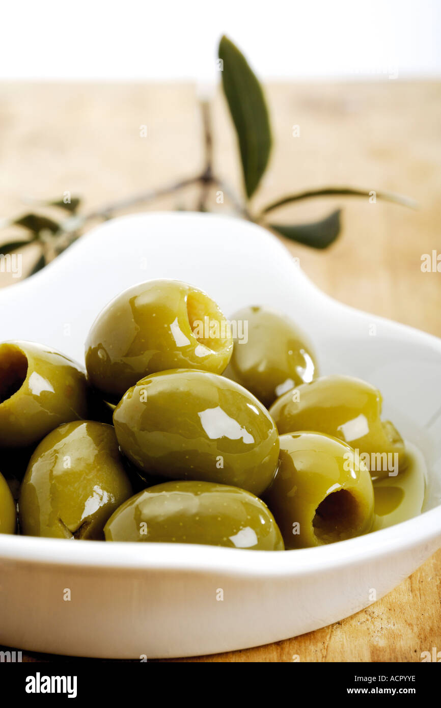 Pickled green olives Stock Photo - Alamy