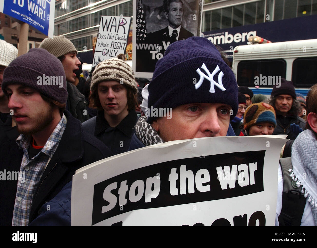 Protester with sign stop the war marching protesting United States and ...