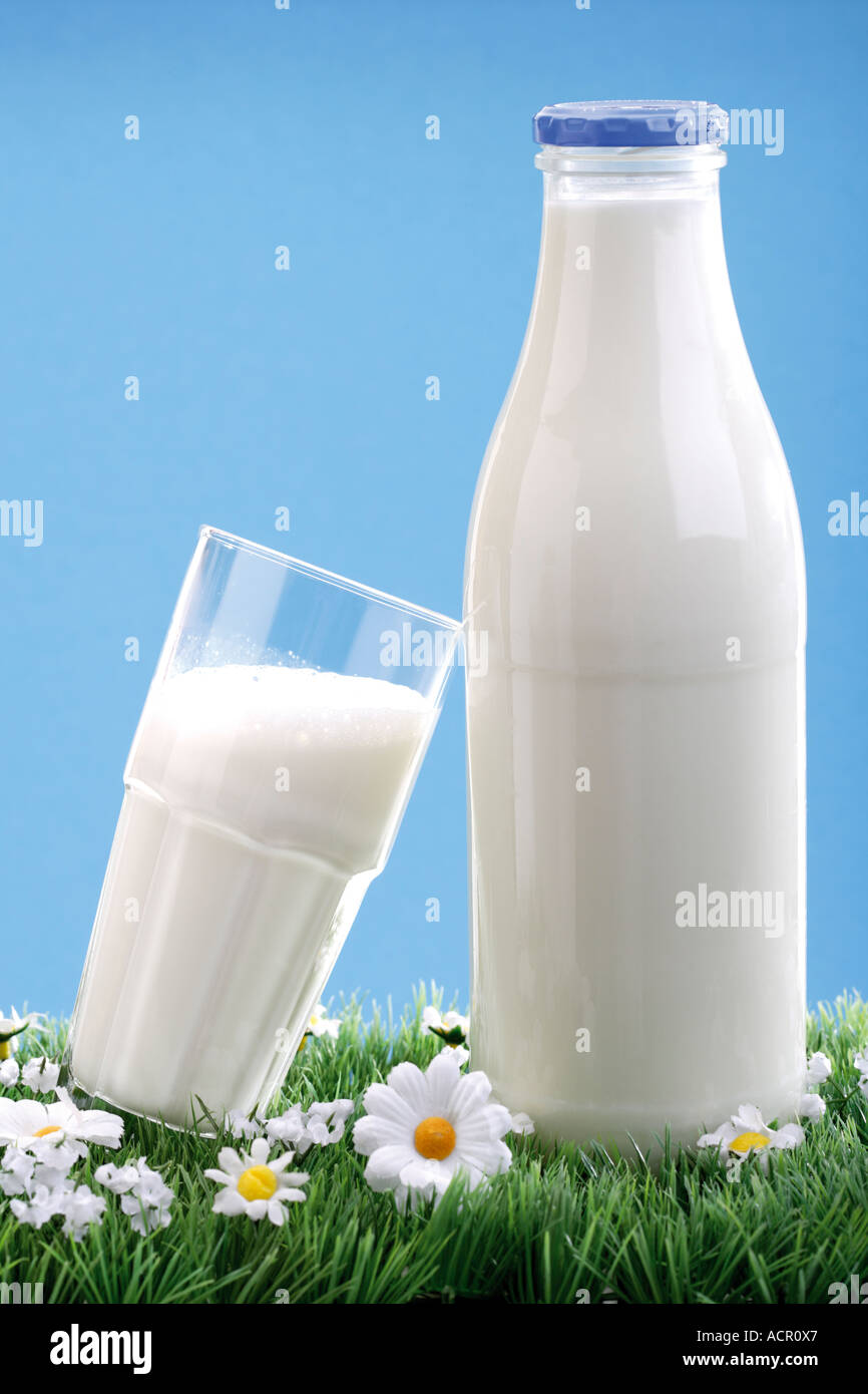 Milk bottle and glass of milk, close-up Stock Photo - Alamy