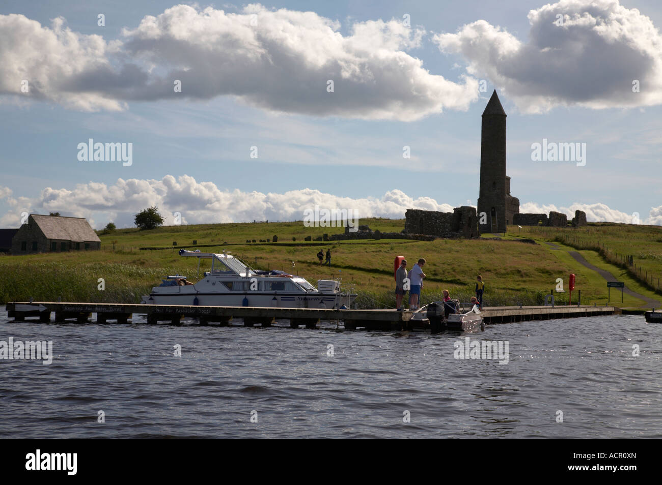 public jetty on Devenish Island with round tower visible as seen from ...