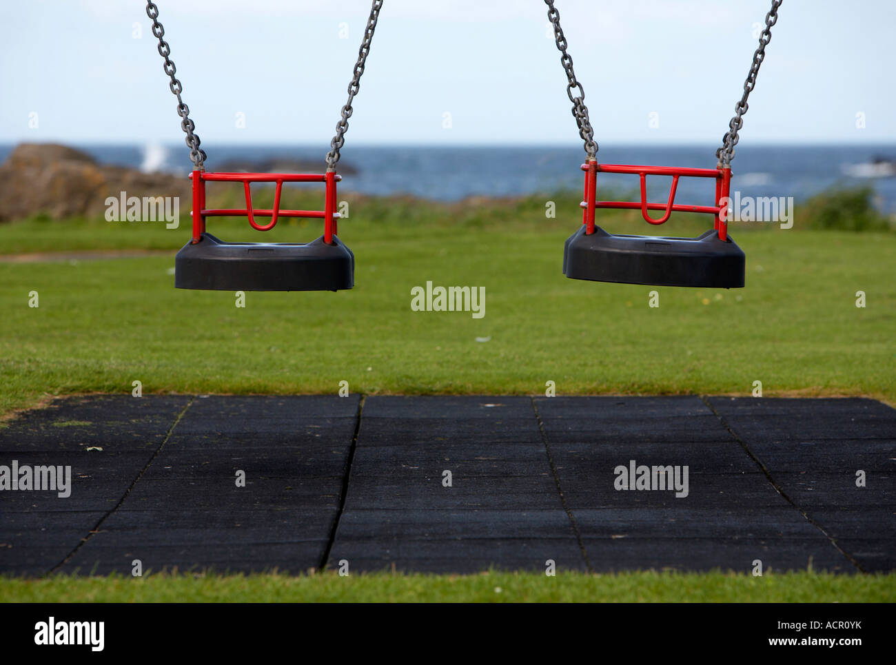 Abandoned swings in a playground hi-res stock photography and images - Alamy