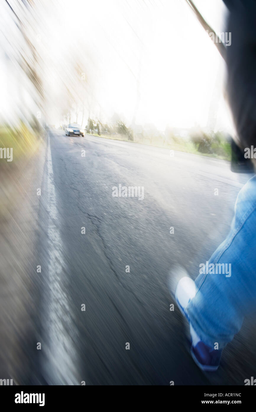 Man walking on highway Stock Photo - Alamy