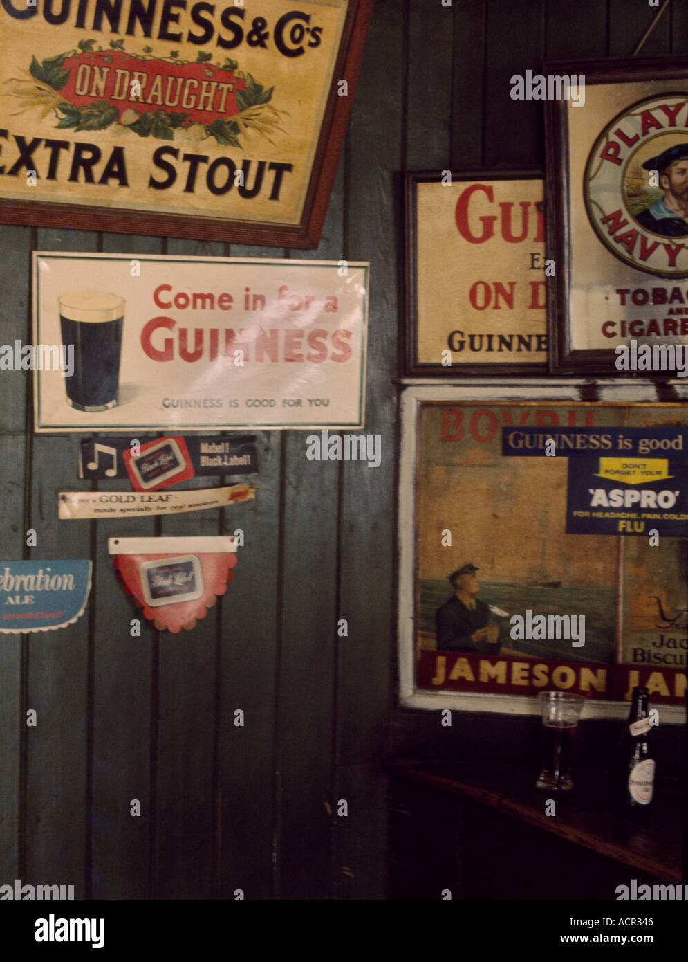pub interior with vintage advertising signs Stock Photo - Alamy
