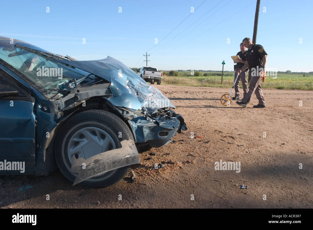 Sheriff deputy measuring skid marks hi-res stock photography and images ...