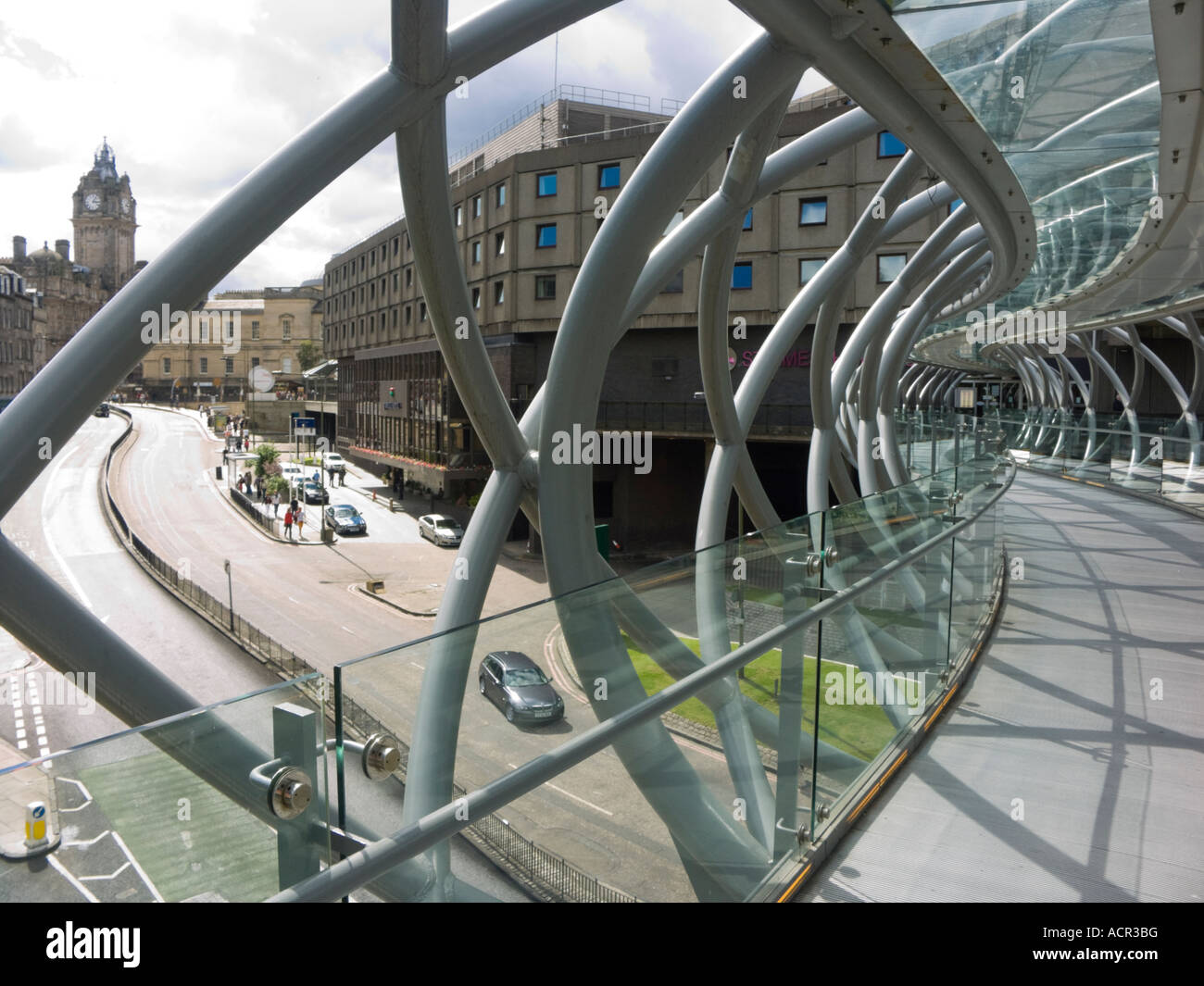 Curving tubular metal footbridge from St James shopping centre to ...