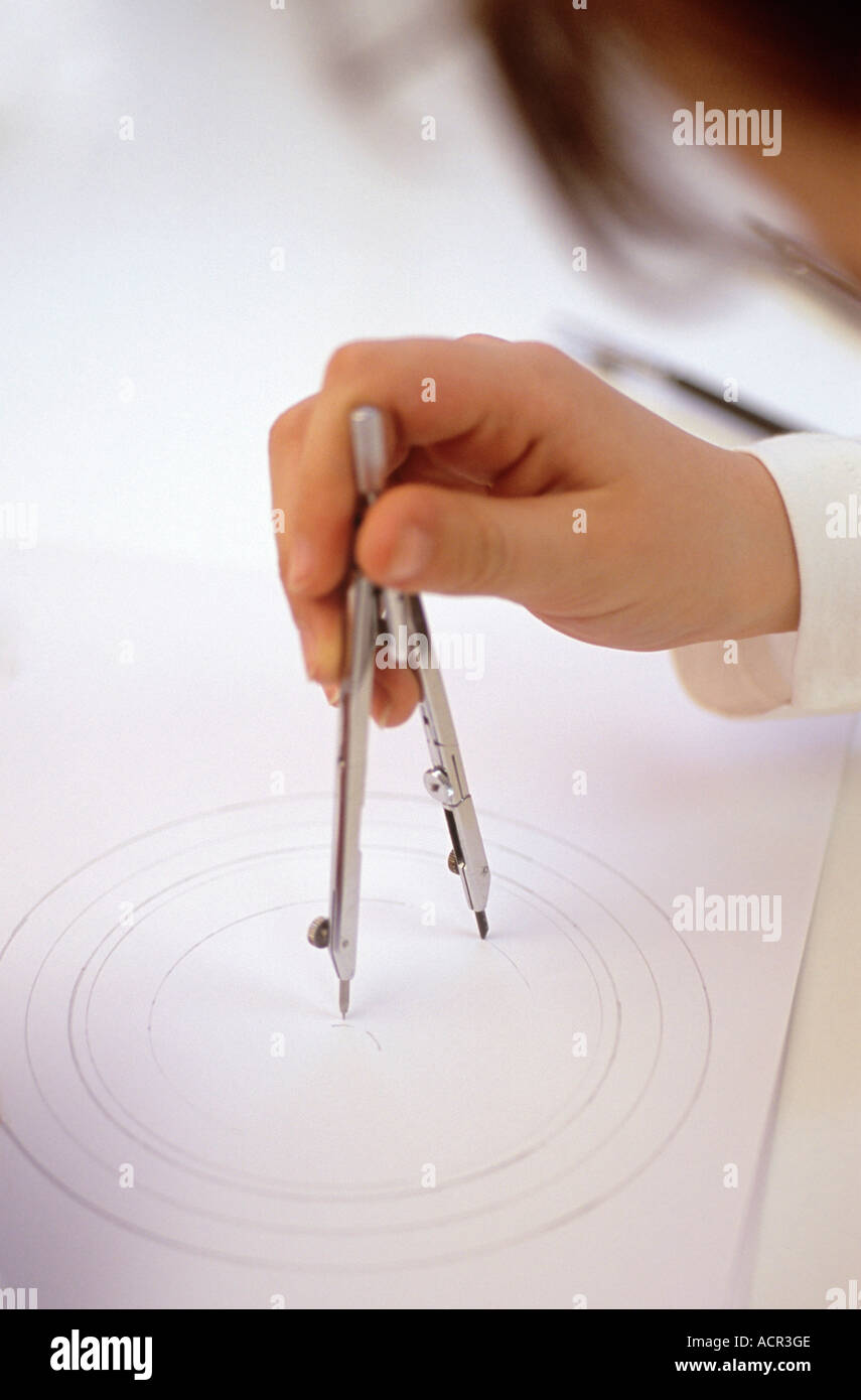 Child using compass, close-up Stock Photo - Alamy