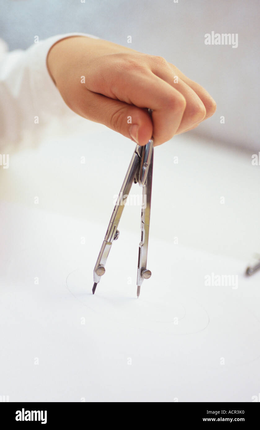 Child using compass Stock Photo - Alamy