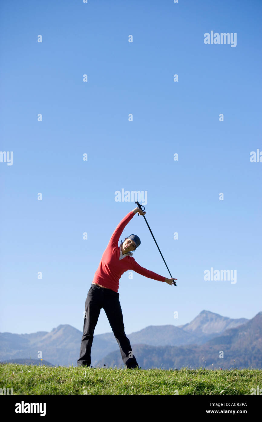 Young woman stretching nordic walking hi-res stock photography and ...