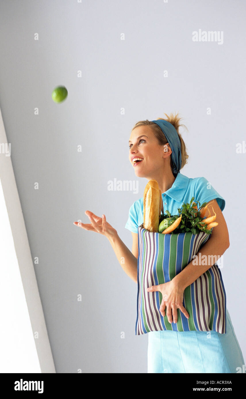 Throwing apple into air hi-res stock photography and images - Alamy